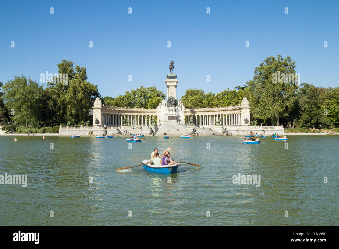 Boating lake in Retiro park in Madrid, Spain. Monument to King Alfonso ...