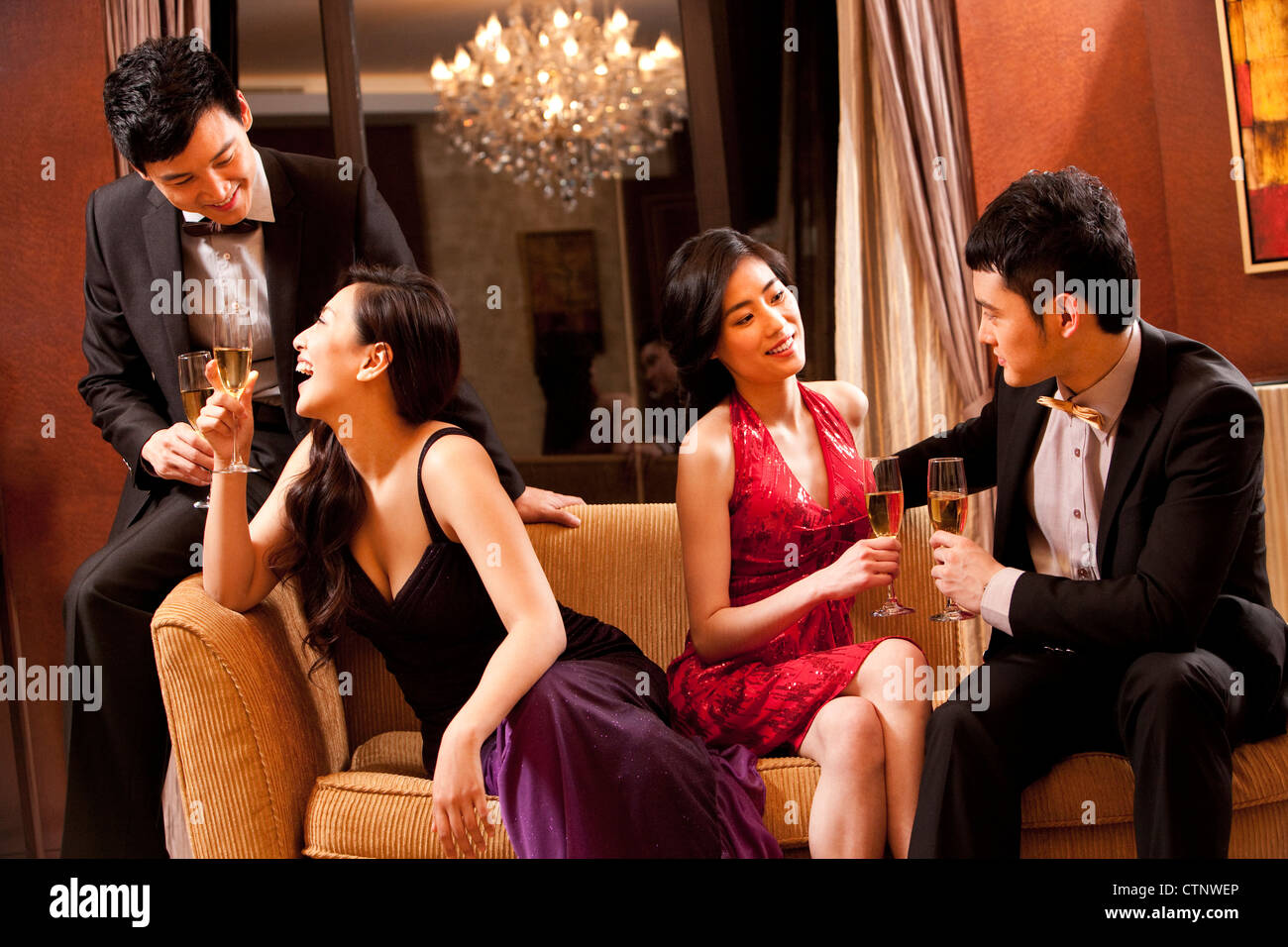 Young people in formal party Stock Photo - Alamy