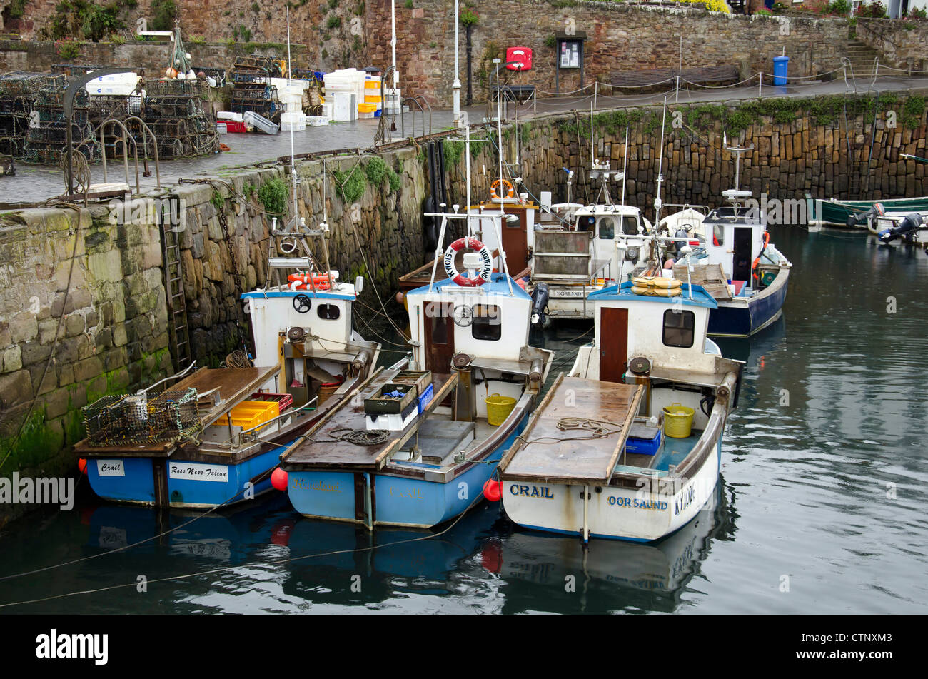 Fishing boats at Crail Harbour, in the East Neuk of Fife, Scotland ...