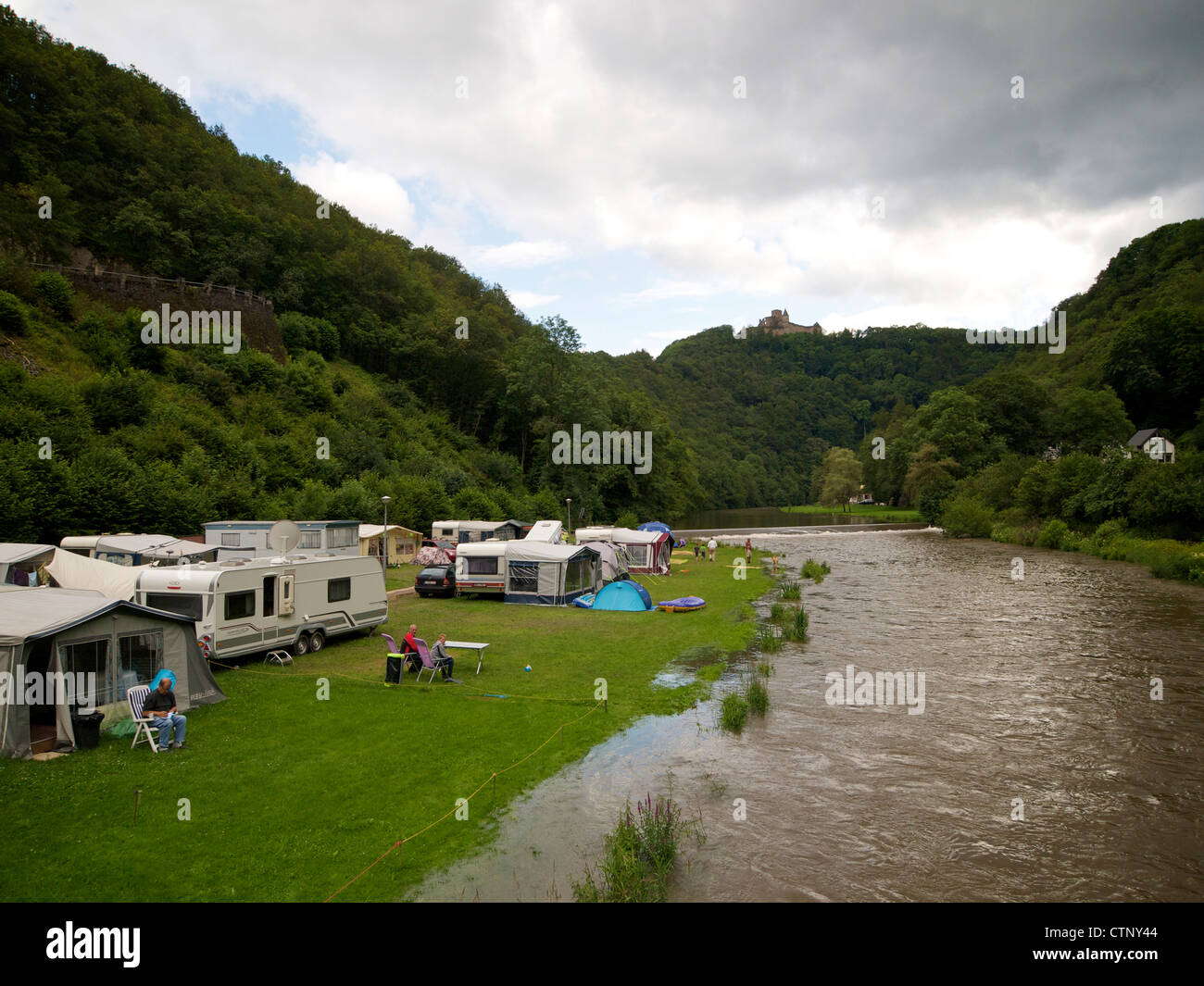 Very wet camping along the Sure river in Bourscheid, Luxemburg, with ...