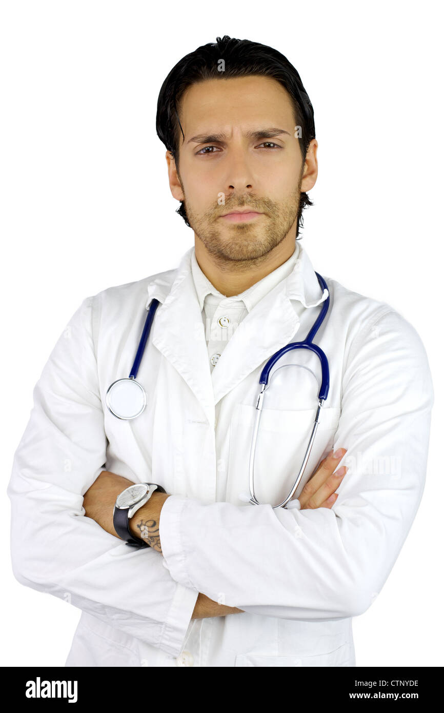 Serious good looking doctor with beard standing Stock Photo - Alamy