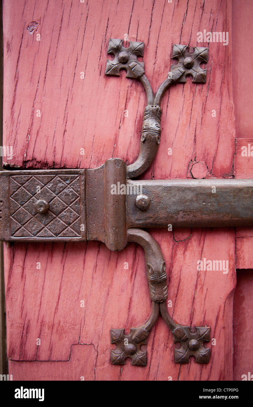 Old red door with metal detail in Paris, France Stock Photo - Alamy
