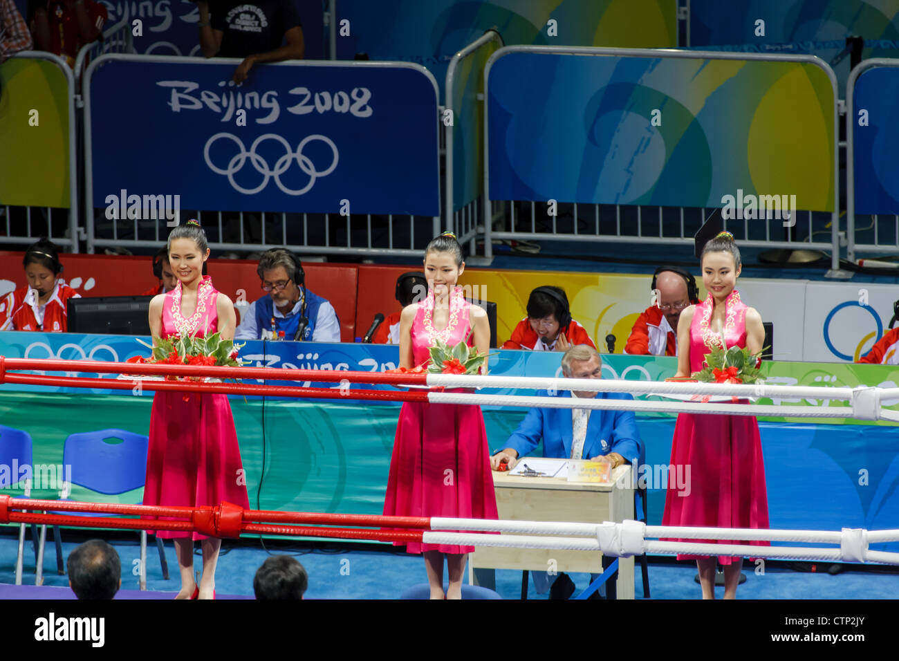 Chinese women presenting medals at boxing awards ceremony on August 23 ...