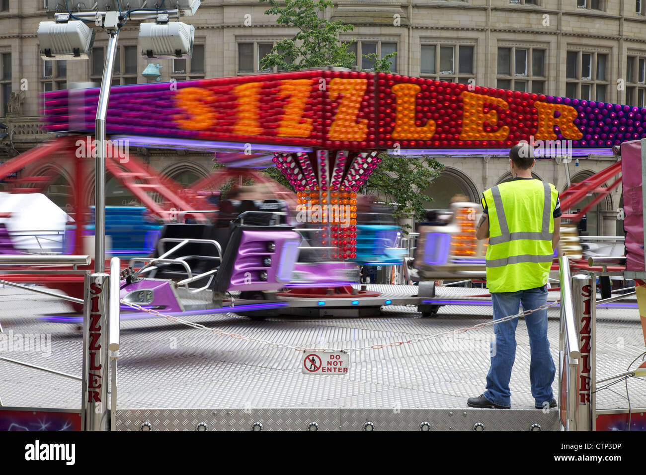 city centre fairground ride Stock Photo - Alamy