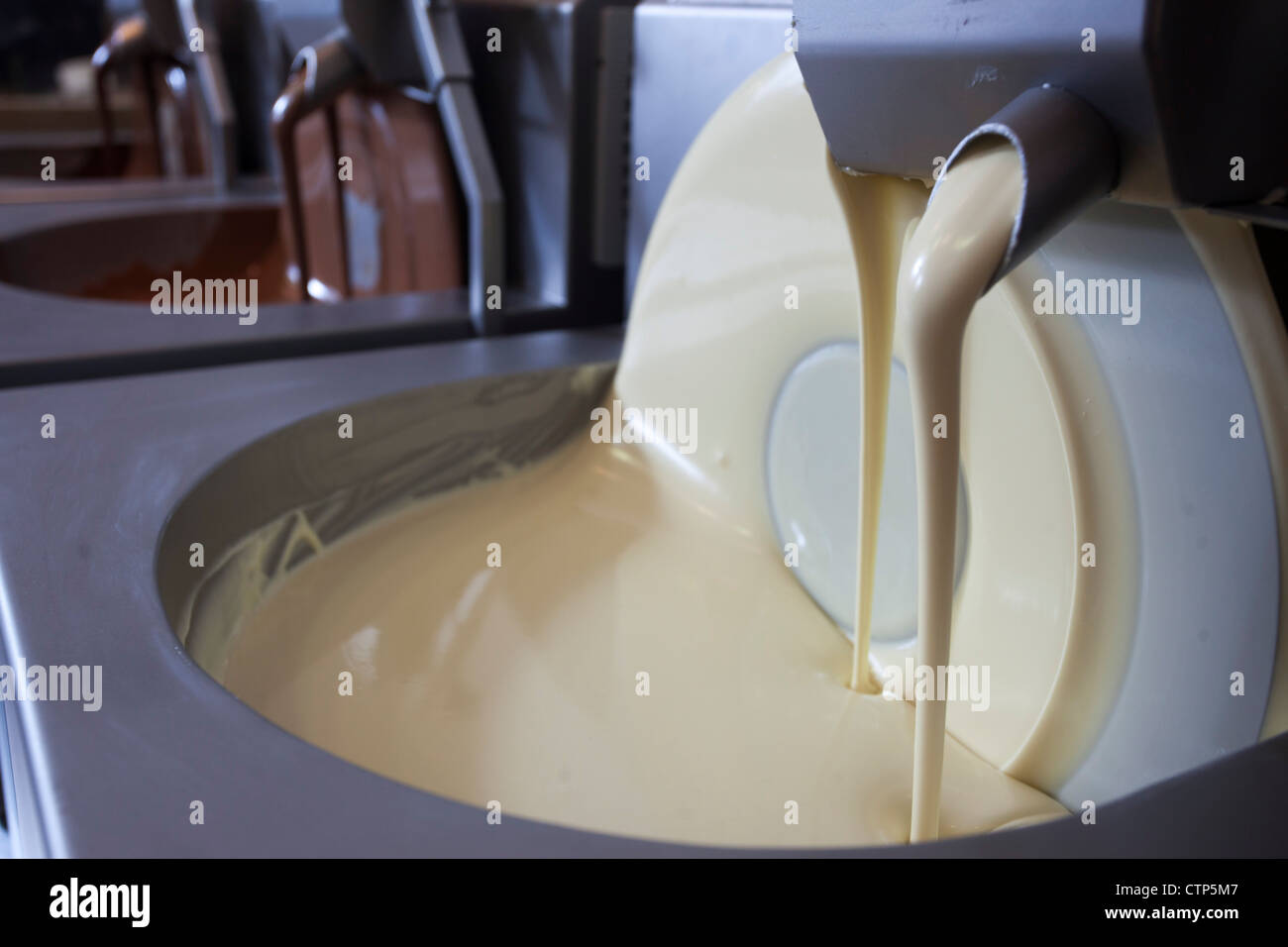 Chocolate factory mixing hi-res stock photography and images - Alamy