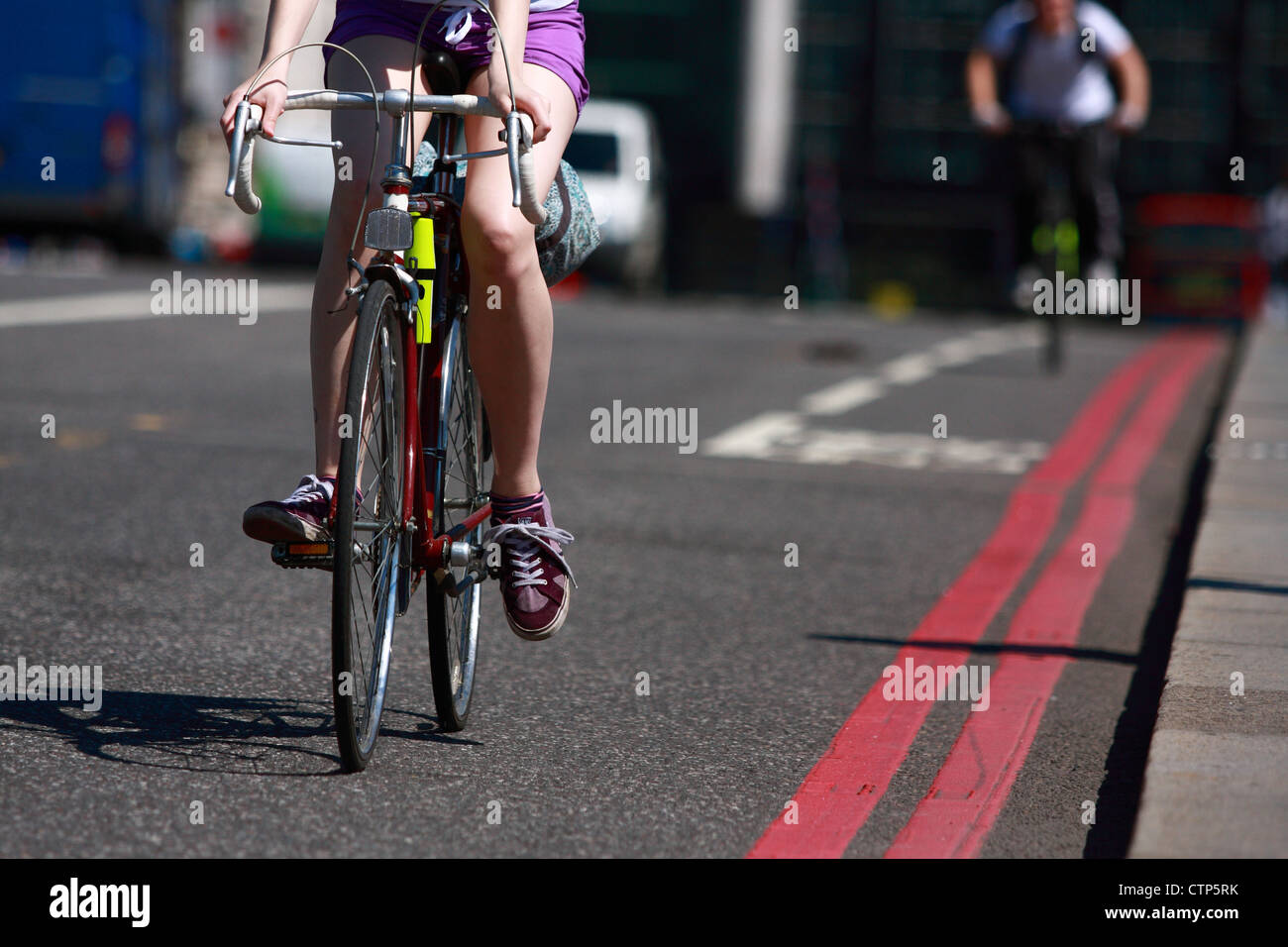 Cycling with legs out hi-res stock photography and images - Alamy