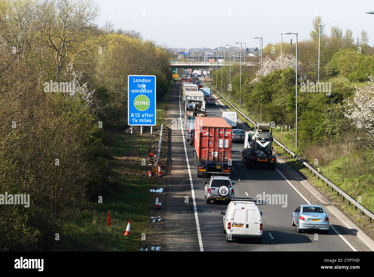 Low emissions sign and traffic on A12 Southbound, Essex, UK Stock Photo ...