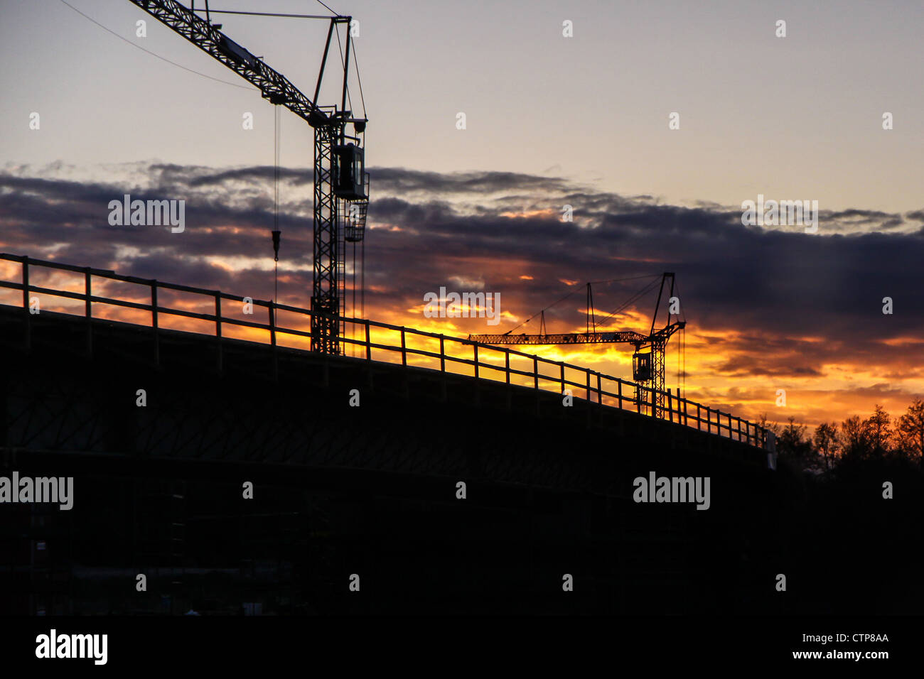 Crane at sunset hi-res stock photography and images - Alamy