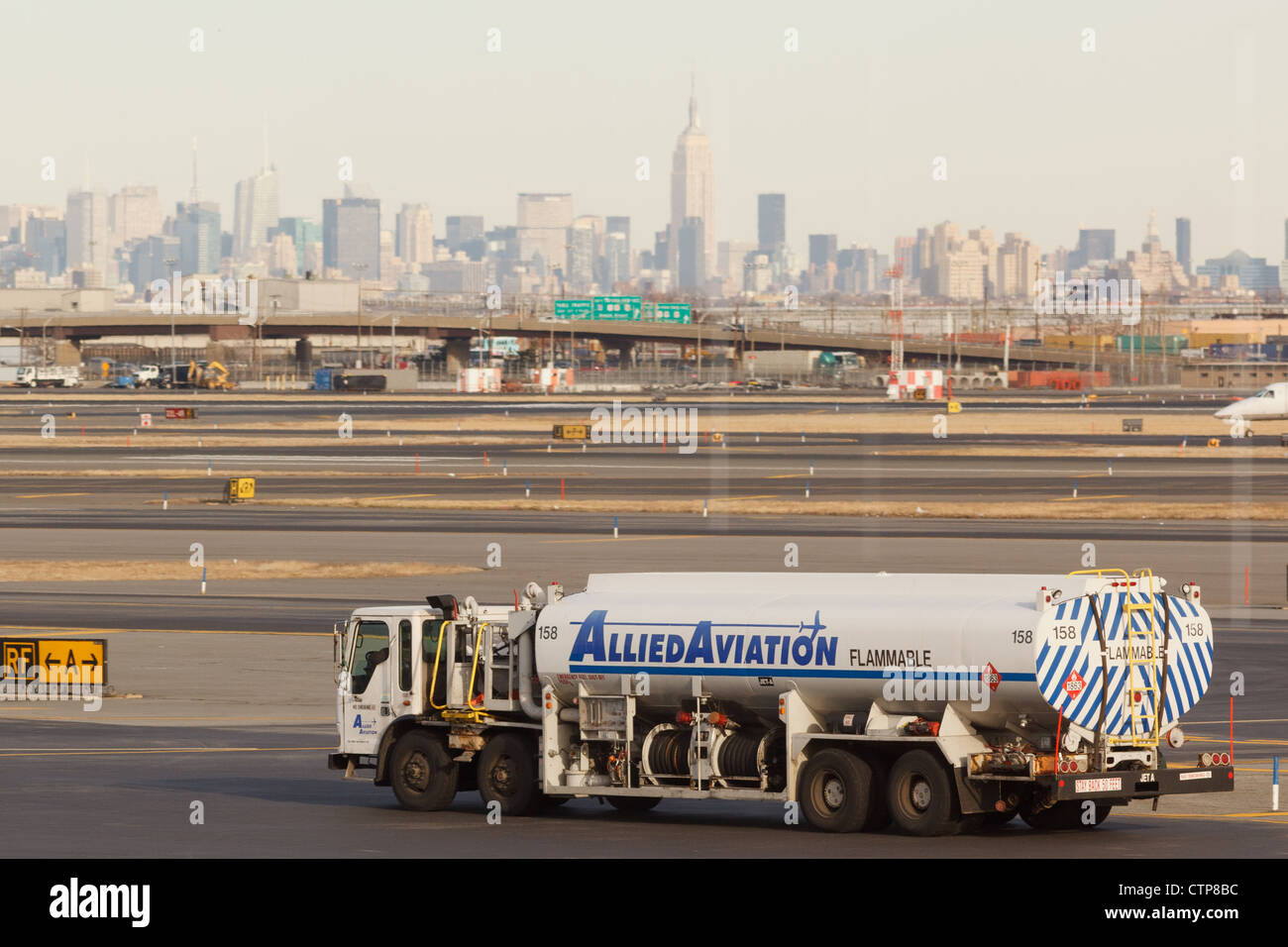 Allied Aviation refueller and Empire State Building Stock Photo - Alamy