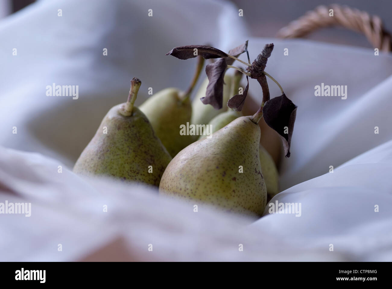 a soft focus image of Guyot pears in a basket Stock Photo - Alamy