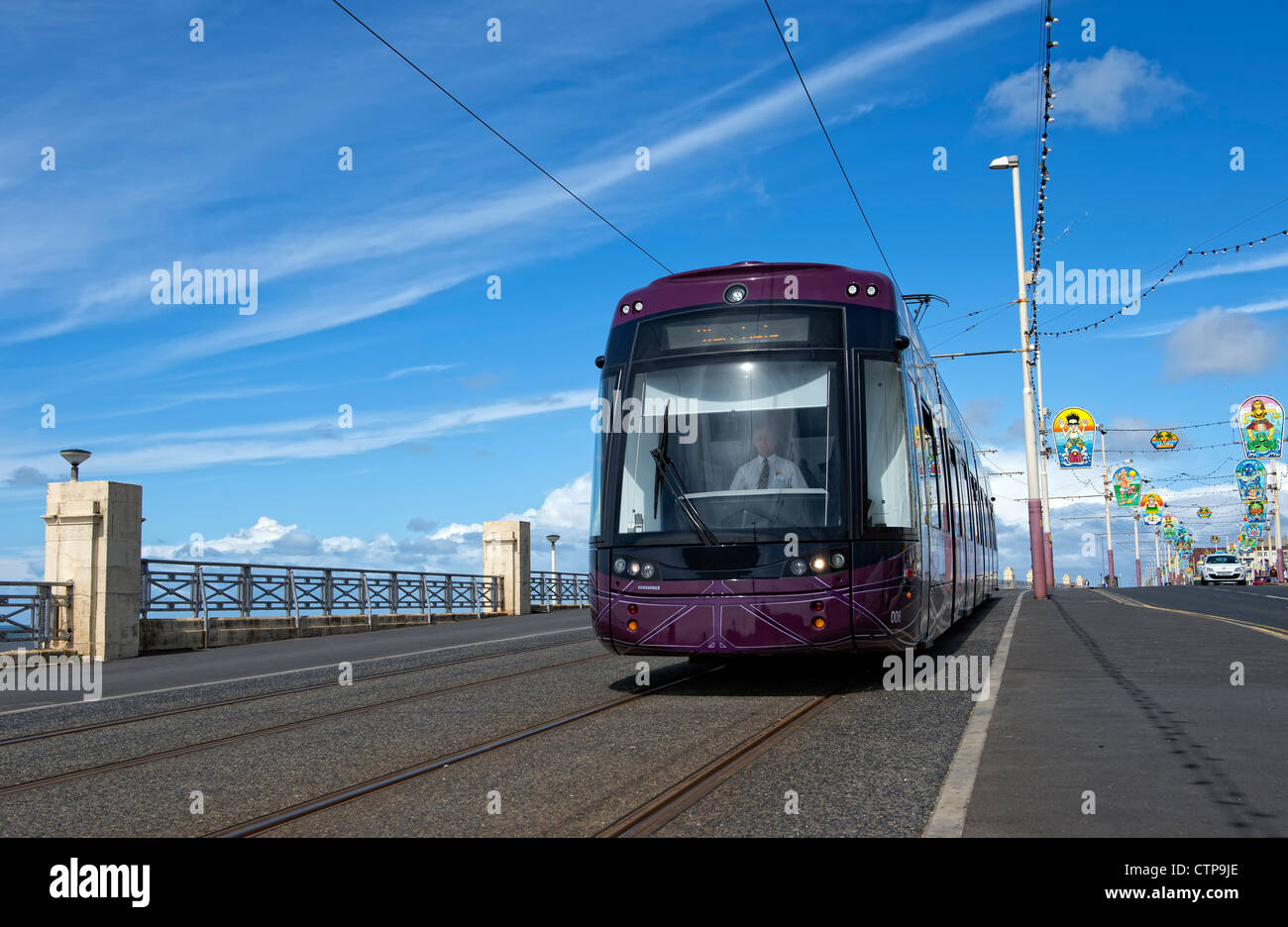 New style tram travelling along the promenade in Blackpool, England ...