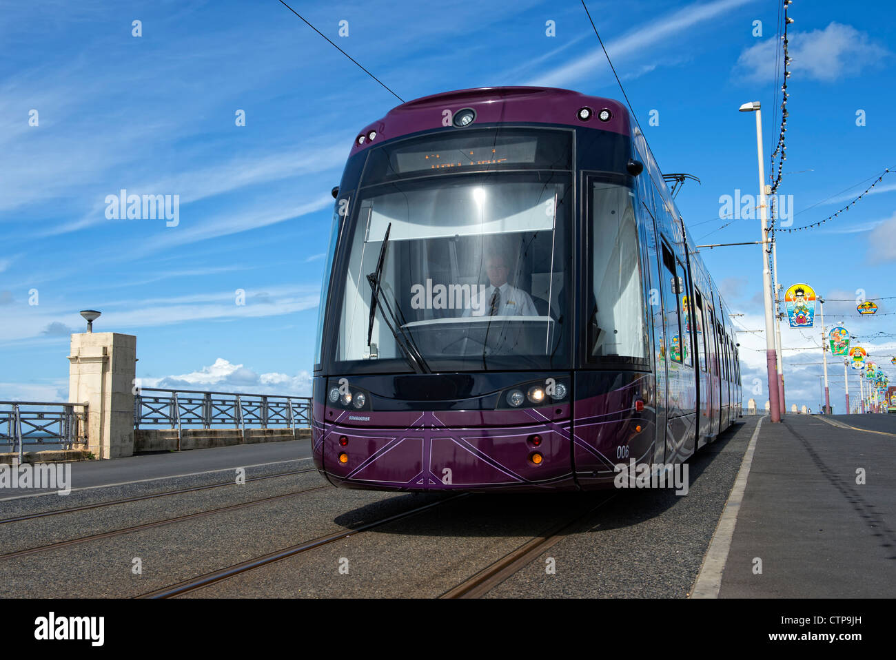 New style tram travelling along the promenade in Blackpool, England ...