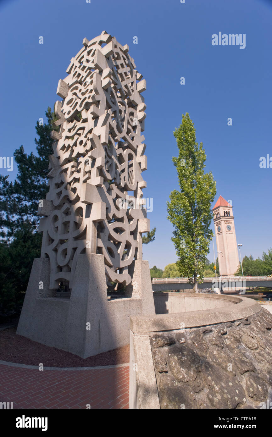 An abstract sculpture and the landmark clock tower at Riverfront Park ...