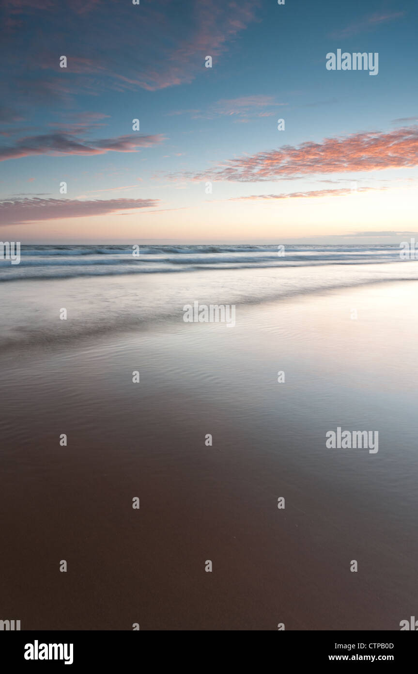 Portrait waves on a beach Stock Photo - Alamy