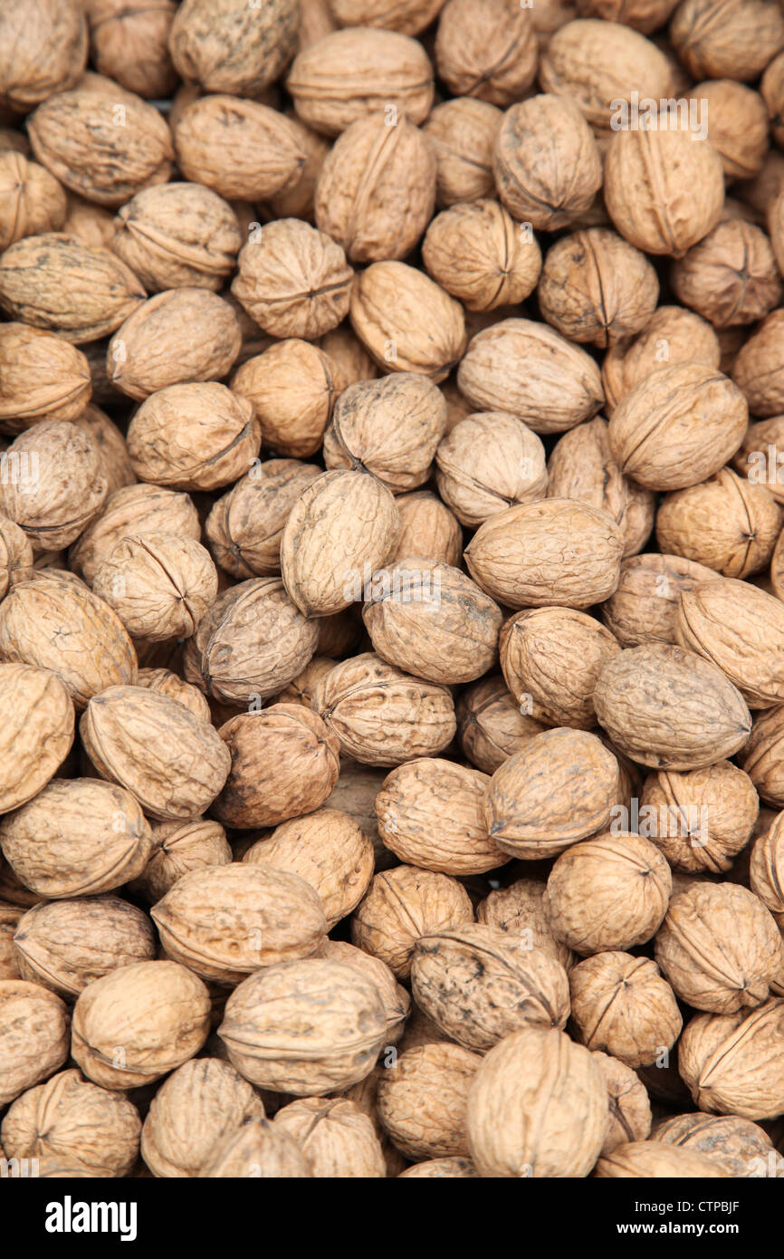 Walnuts in there shells hi-res stock photography and images - Alamy
