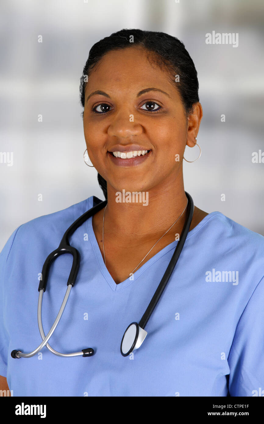 Minority nurse working at her job in a hospital Stock Photo - Alamy