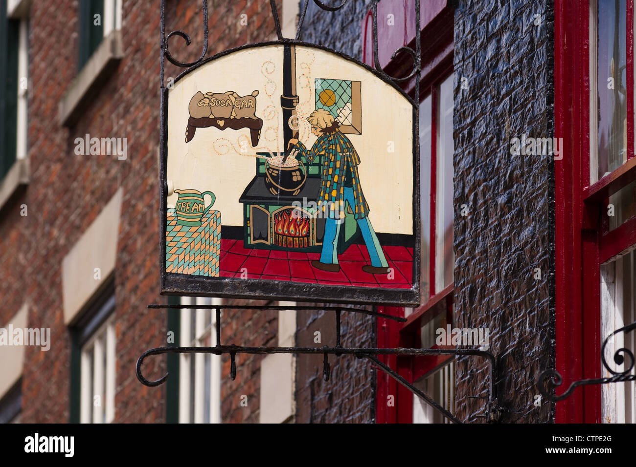 Cook Pot, cooking over a fire wood burning stove. Kitchen scene sign in ...