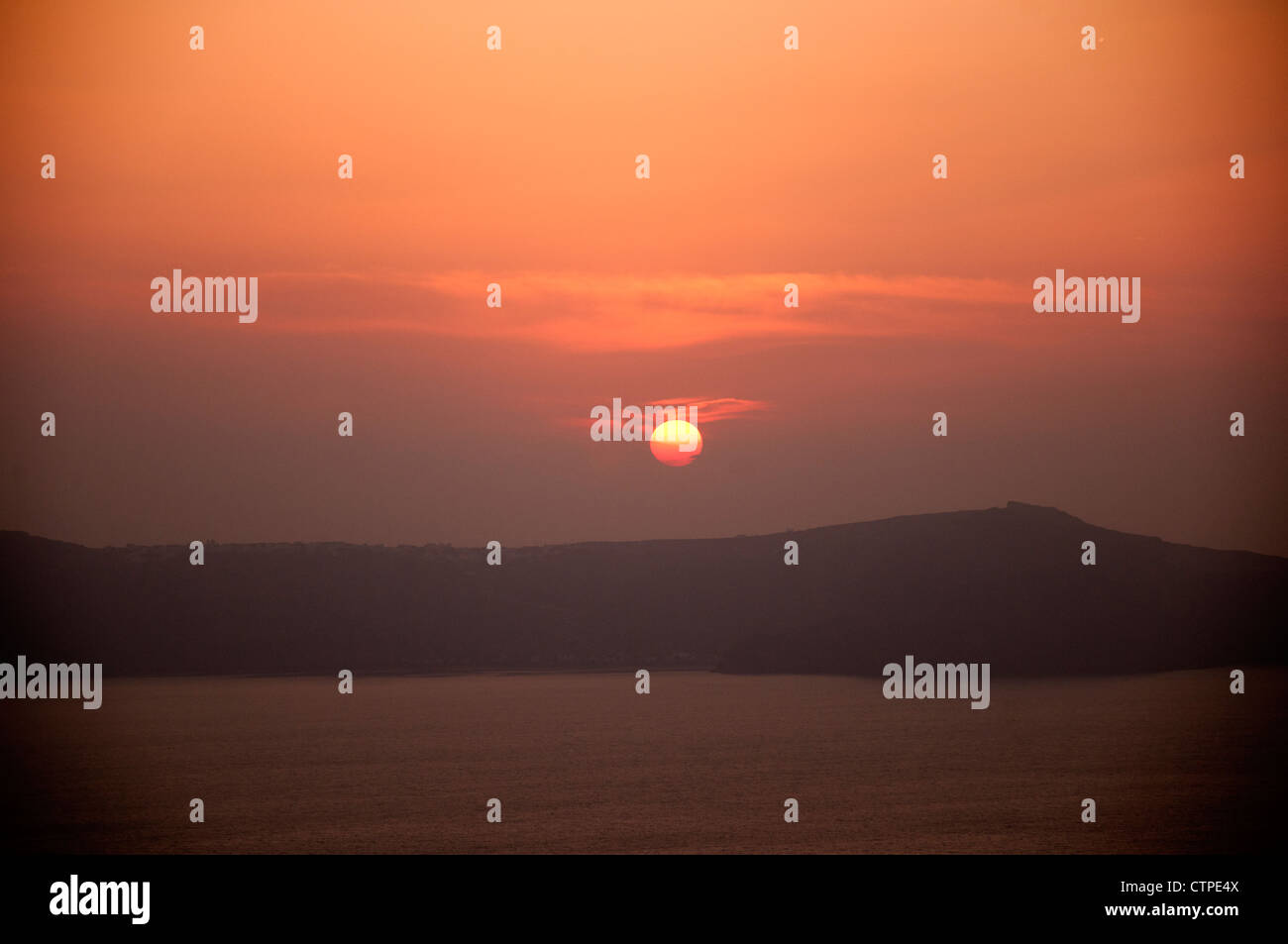 Sunset at Fira the Capital town on the island of Santorini in the ...