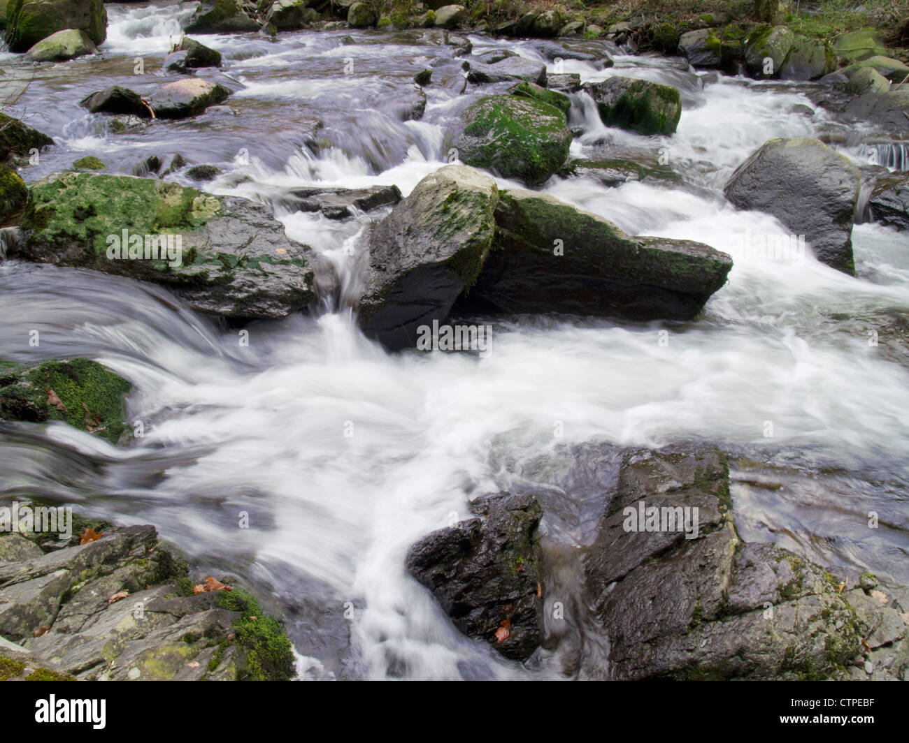 River flowing over rocks Stock Photo - Alamy