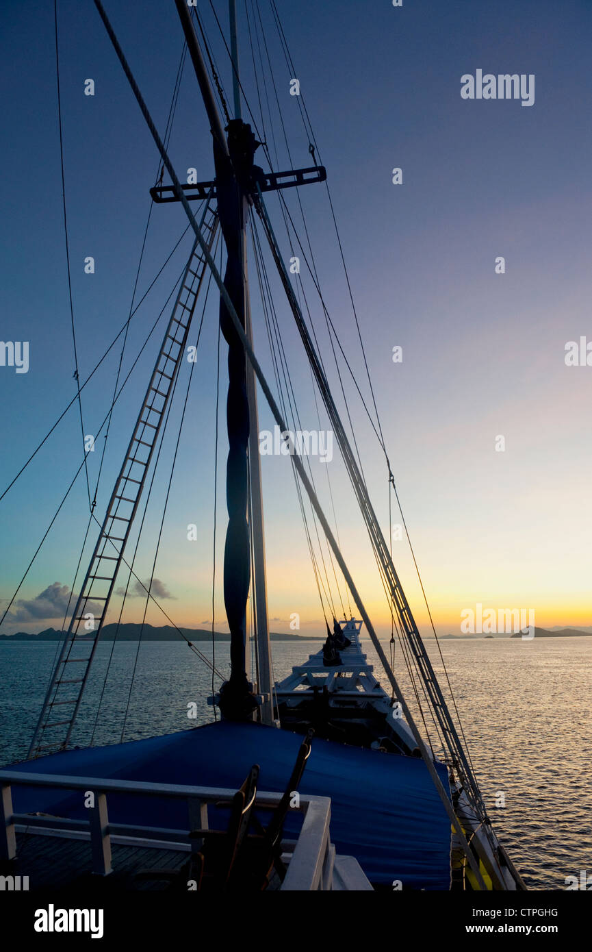 Sunrise aboard the 108 foot "Ombak Putih", a traditional Phinisi ...