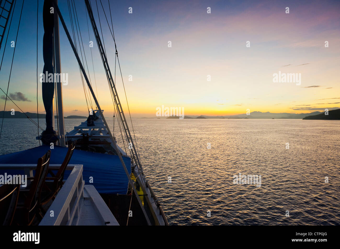 Sunrise aboard the 108 foot "Ombak Putih", a traditional Phinisi ...