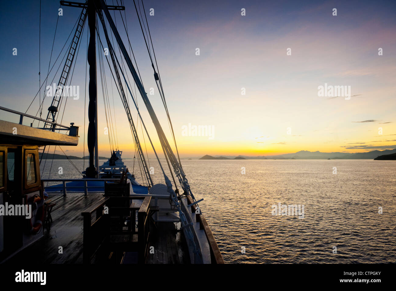Sunrise aboard the 108 foot "Ombak Putih", a traditional Phinisi ...