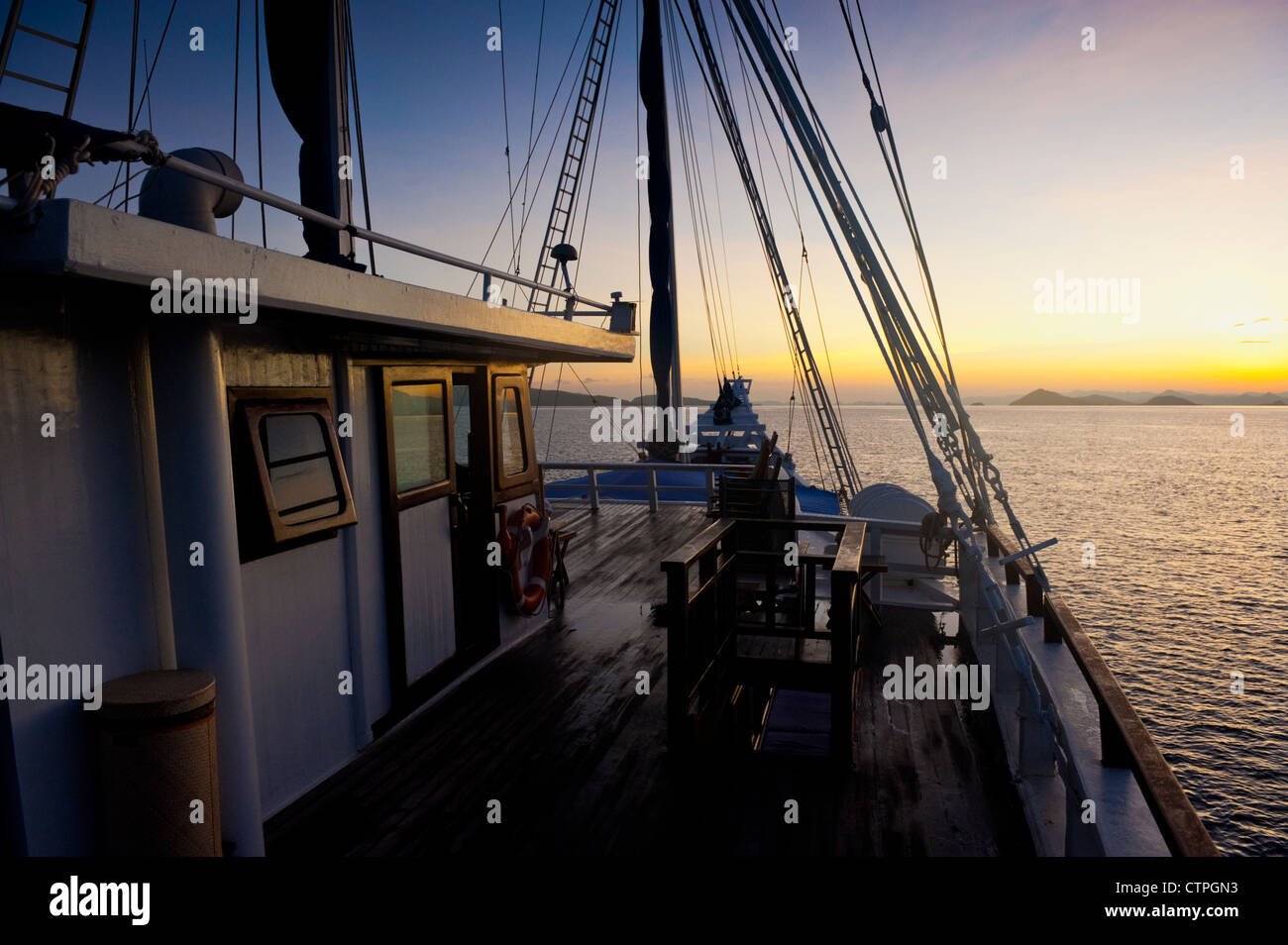Sunrise aboard the 108 foot "Ombak Putih", a traditional Phinisi ...