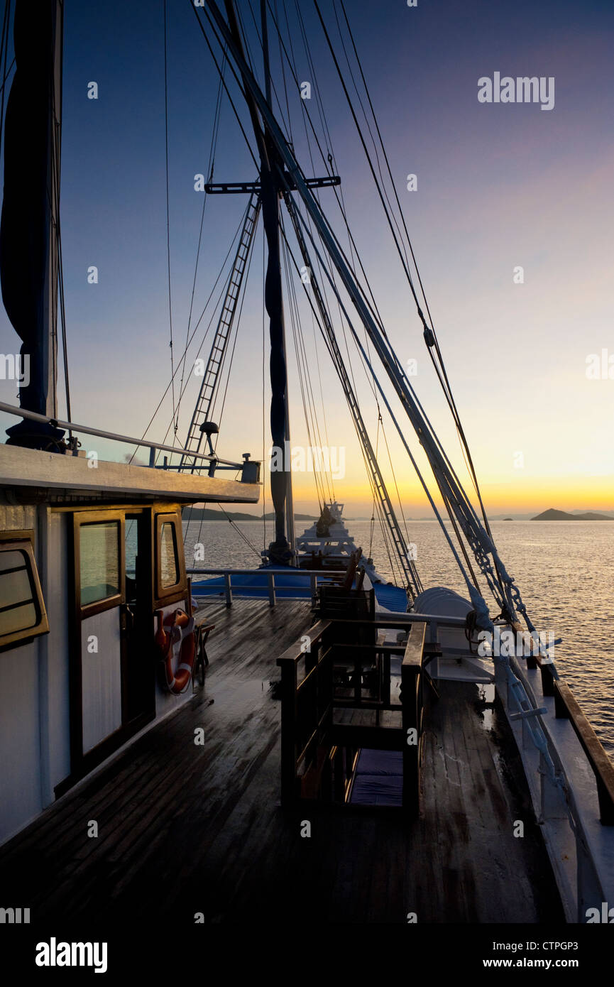 Sunrise aboard the 108 foot "Ombak Putih", a traditional Phinisi ...