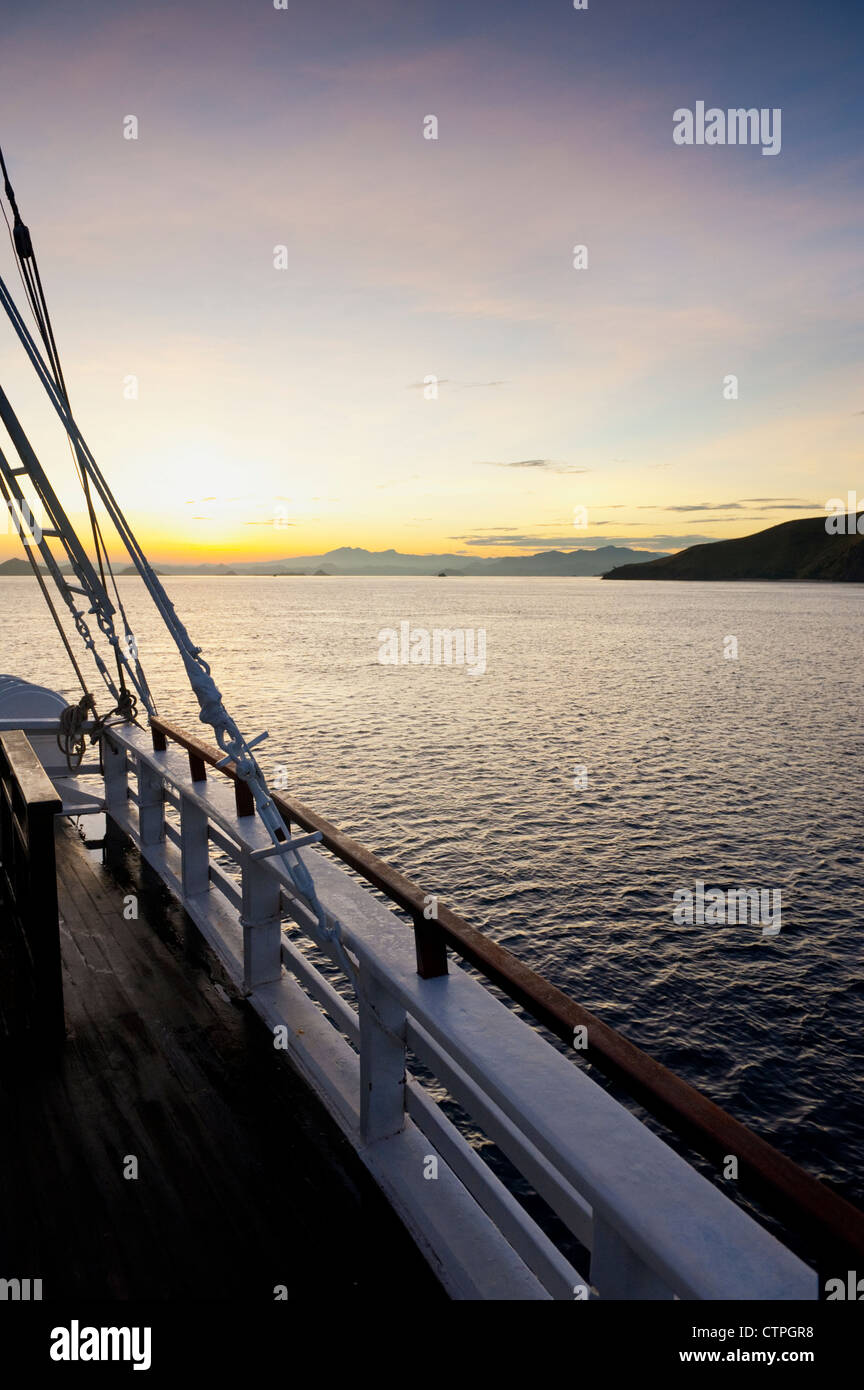 Sunrise aboard the 108 foot "Ombak Putih", a traditional Phinisi ...