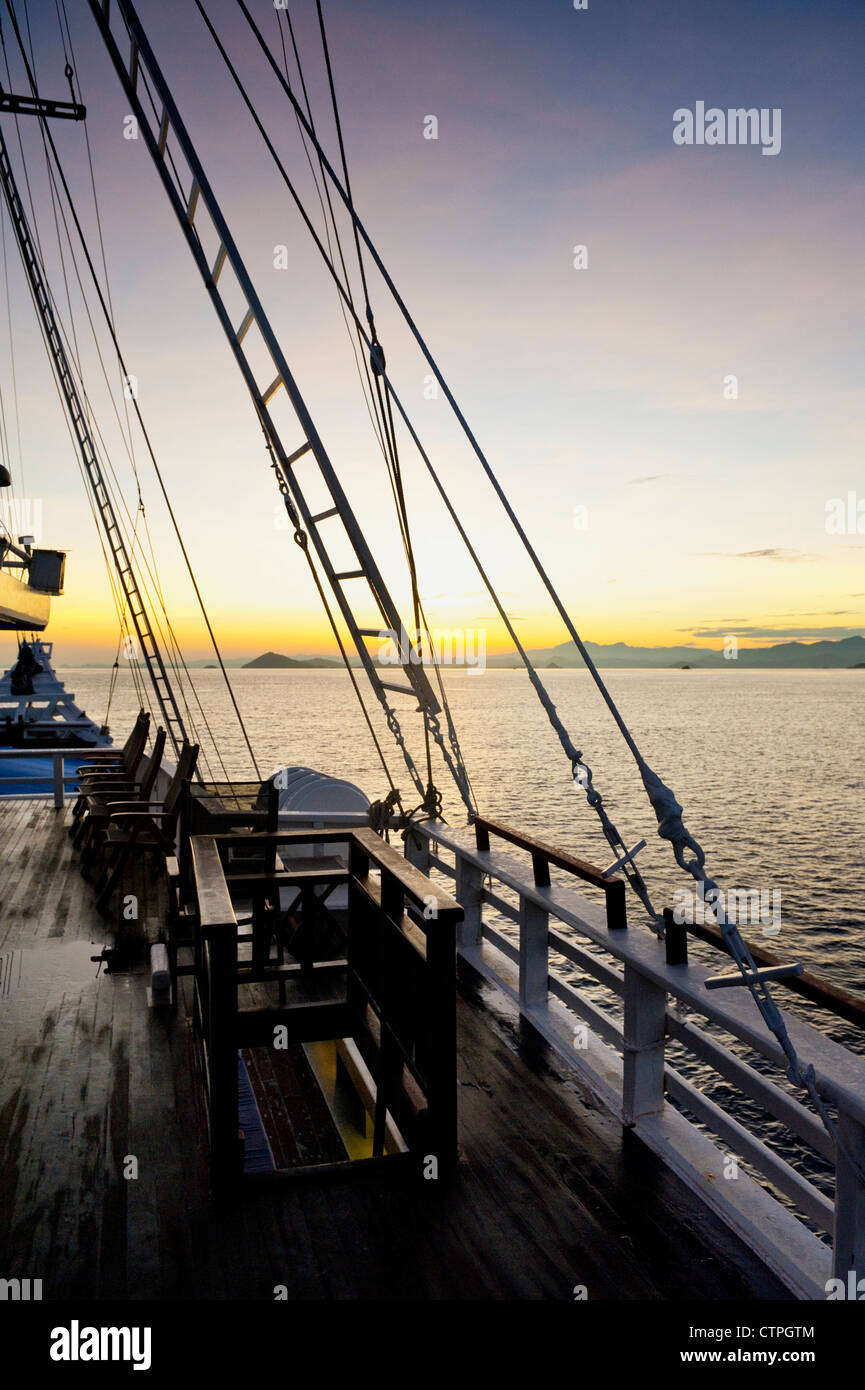 Sunrise aboard the 108 foot "Ombak Putih", a traditional Phinisi ...