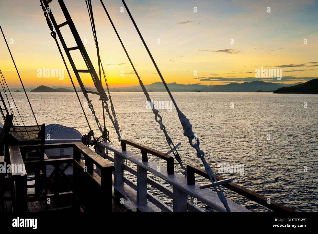 Sunrise aboard the 108 foot "Ombak Putih", a traditional Phinisi ...