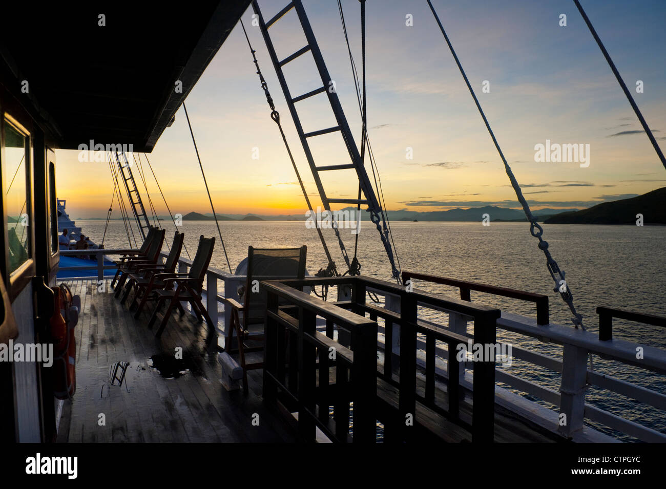 Sunrise aboard the 108 foot "Ombak Putih", a traditional Phinisi ...