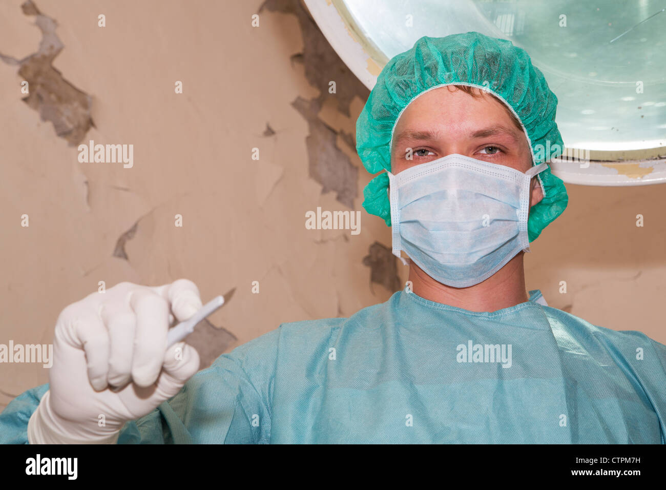 Surgeon have sadistic look before coming difficult surgery Stock Photo ...