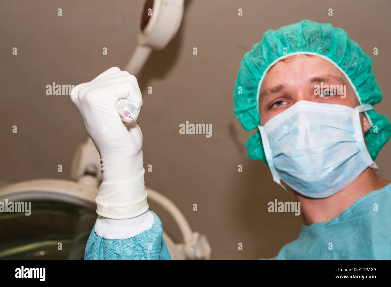 Surgeon making opiate injection before coming difficult surgery Stock ...