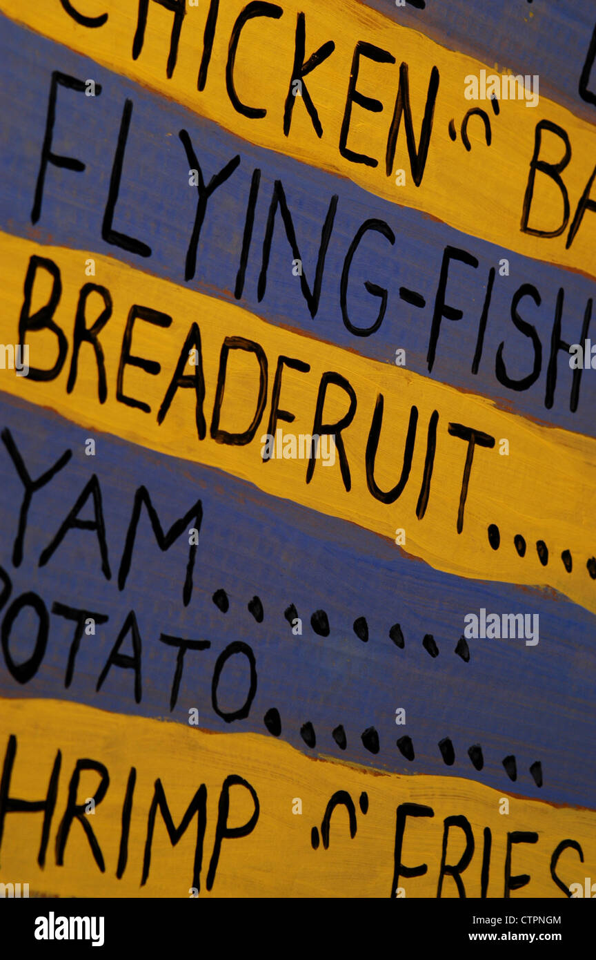 Caribbean menu detailing flying-fish,yam;chicken and bake, shrimp and ...
