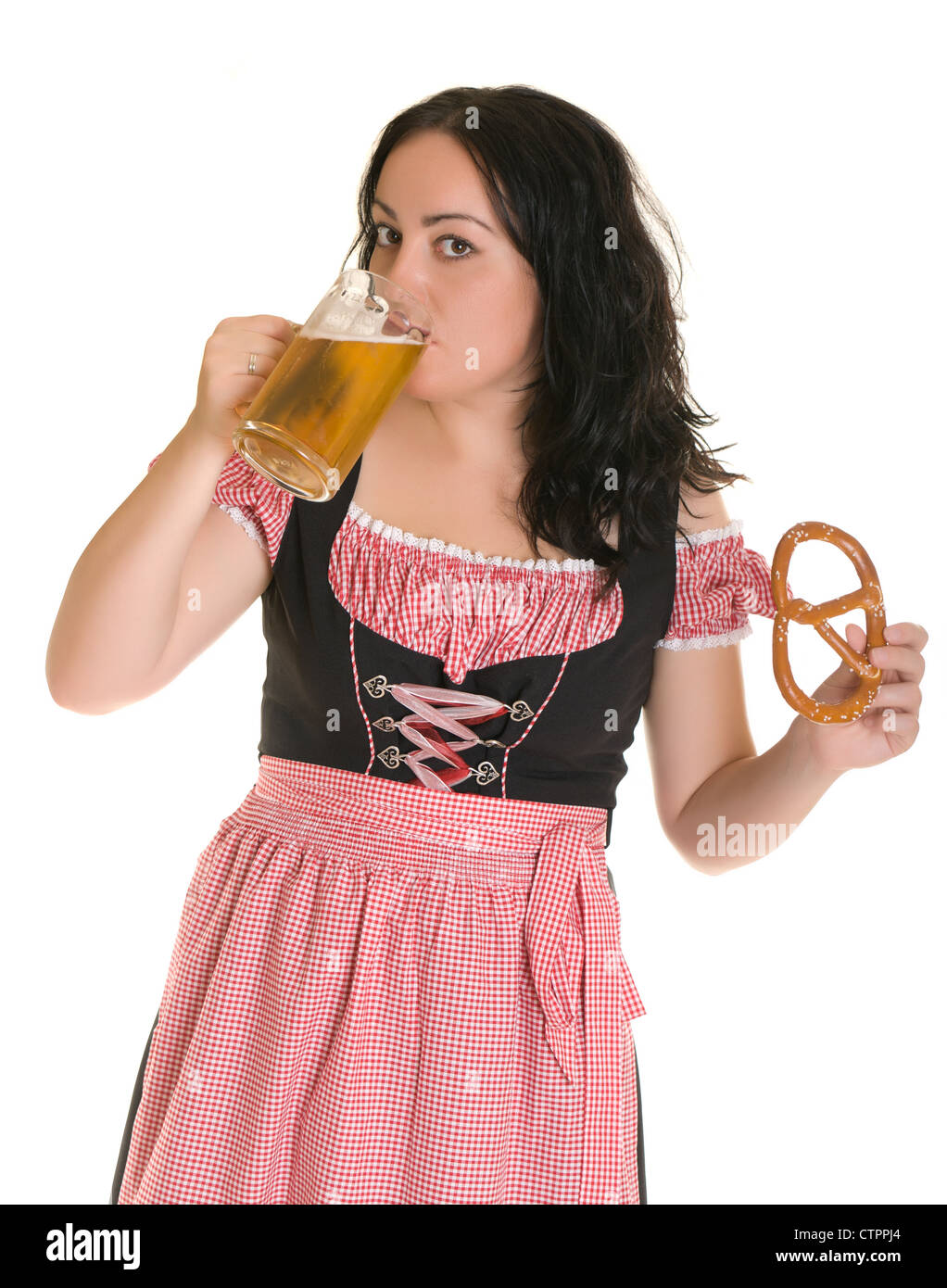 An attractive woman in Bavarian national dress (Dirndl), with a beer ...