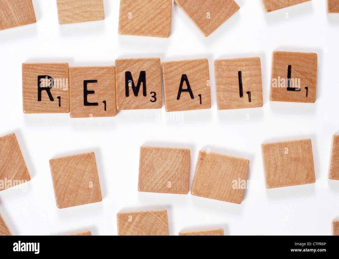 A new dictionary word: Remail, spelled out with wooden tiles Stock ...