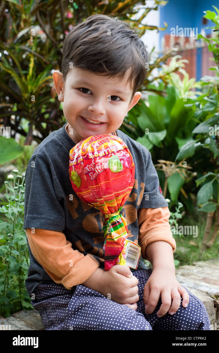 smiling happy young boy with large lollipop Stock Photo - Alamy smiling happy young boy with large lollipop Stock Photo - Alamy