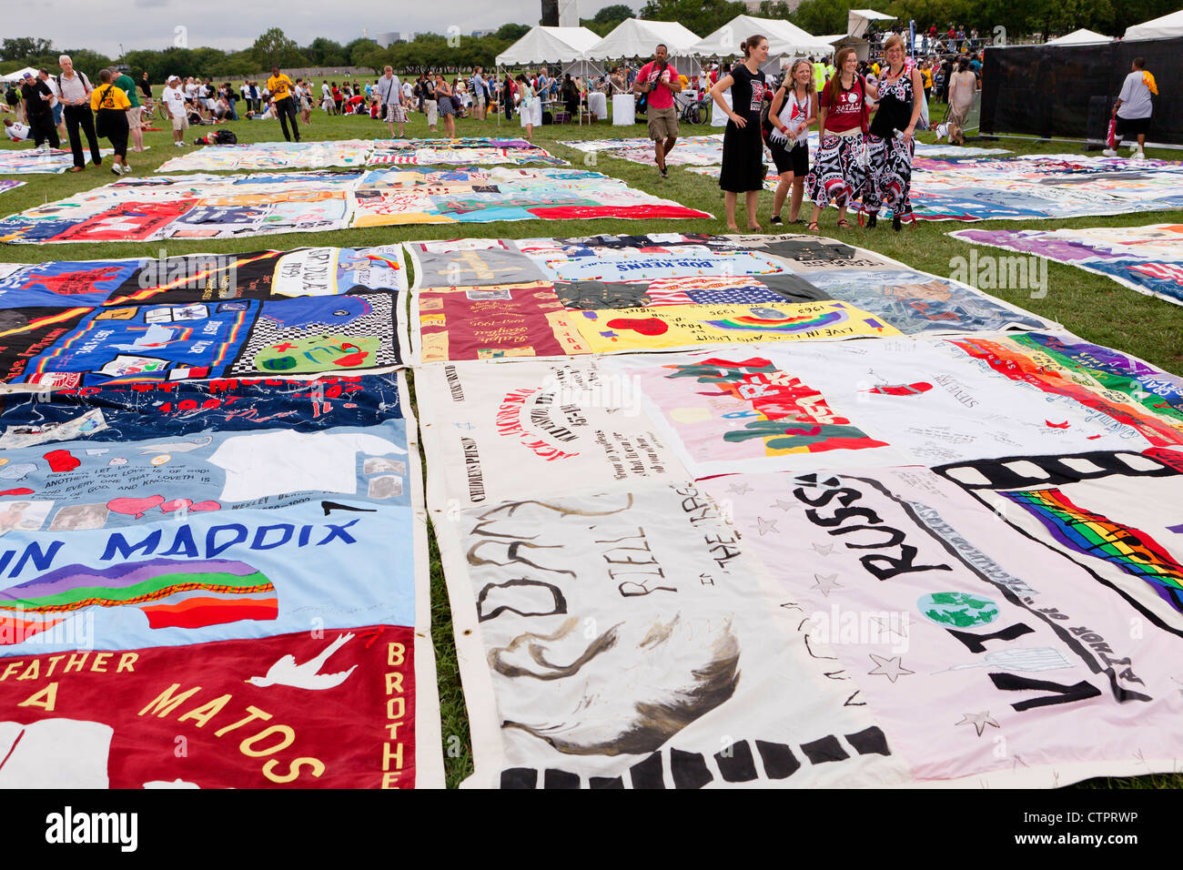 AIDS Memorial Quilt panels are put on display on the Mall to mark its ...