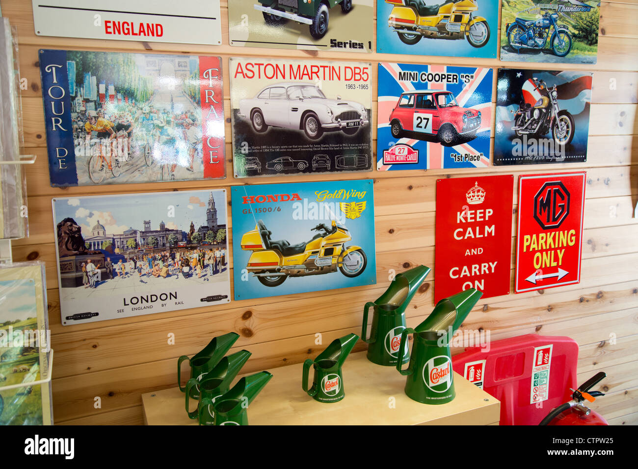 Reproduction, motoring advertising signs in shop at Brooklands Museum ...