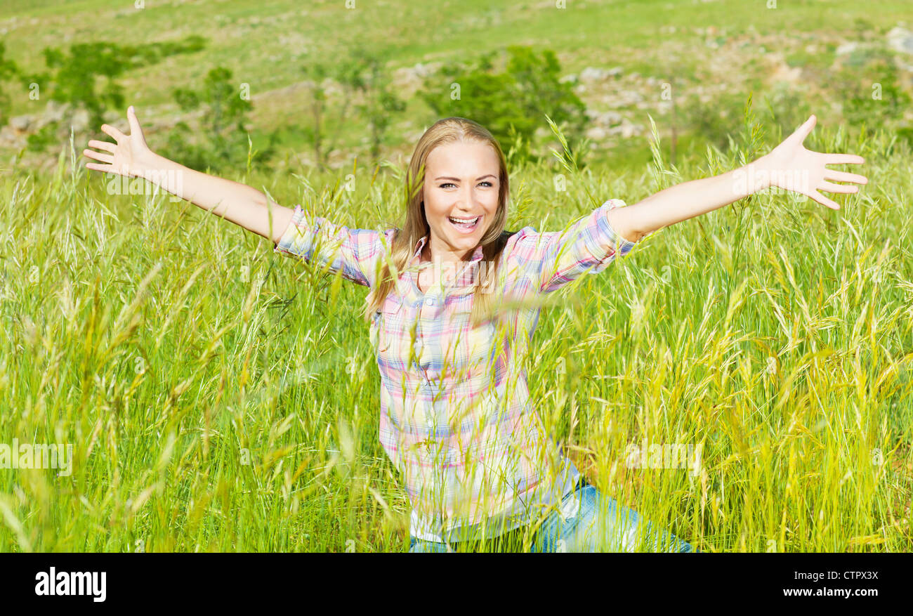Active female over nature landscape, beautiful girl playing outdoors ...
