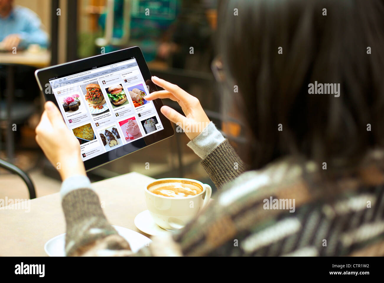 Close up picture of a female browsing Pinterest, social photo sharing ...
