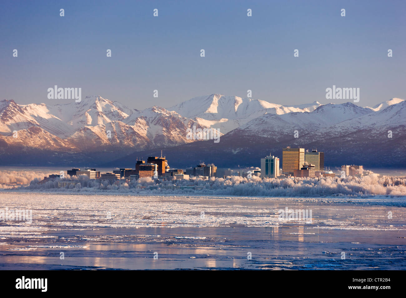 Hoarfrost covers trees along Anchorage skyline icy Cook Inlet in ...