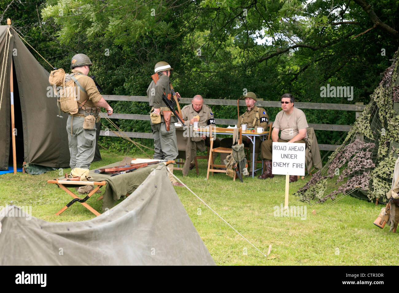 Actors chat whilst dressed in WW2 period US Army GI uniforms at a ...