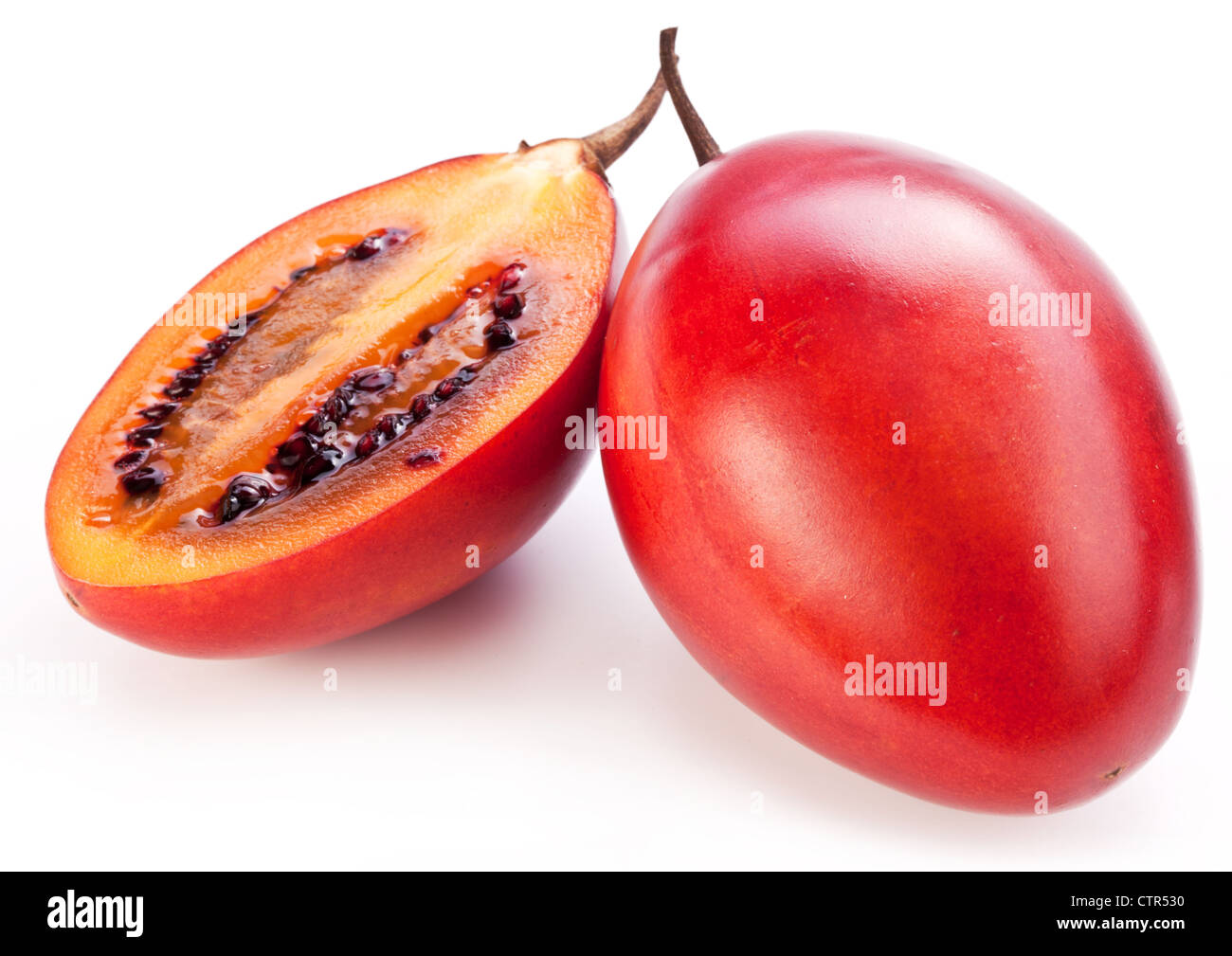 Tamarillo fruits with slice on white background Stock Photo - Alamy