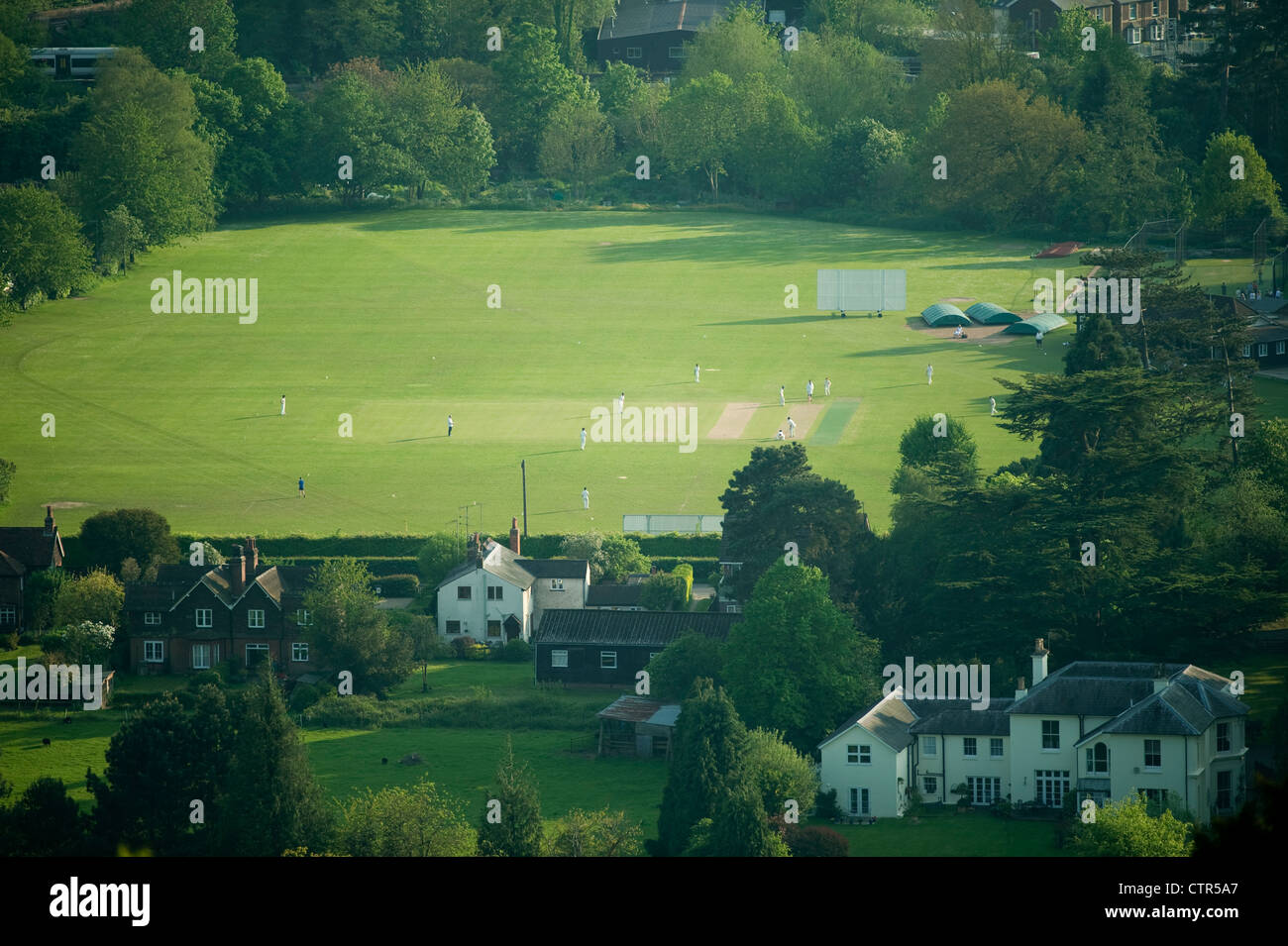 Cricket match being played at Dorking in Surrey on an English summer ...