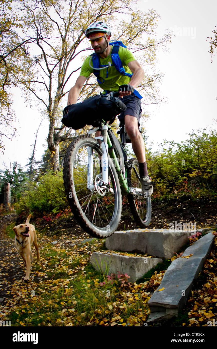 Man mountain biking over rocks, Anchorage hillside trails, Southcentral ...