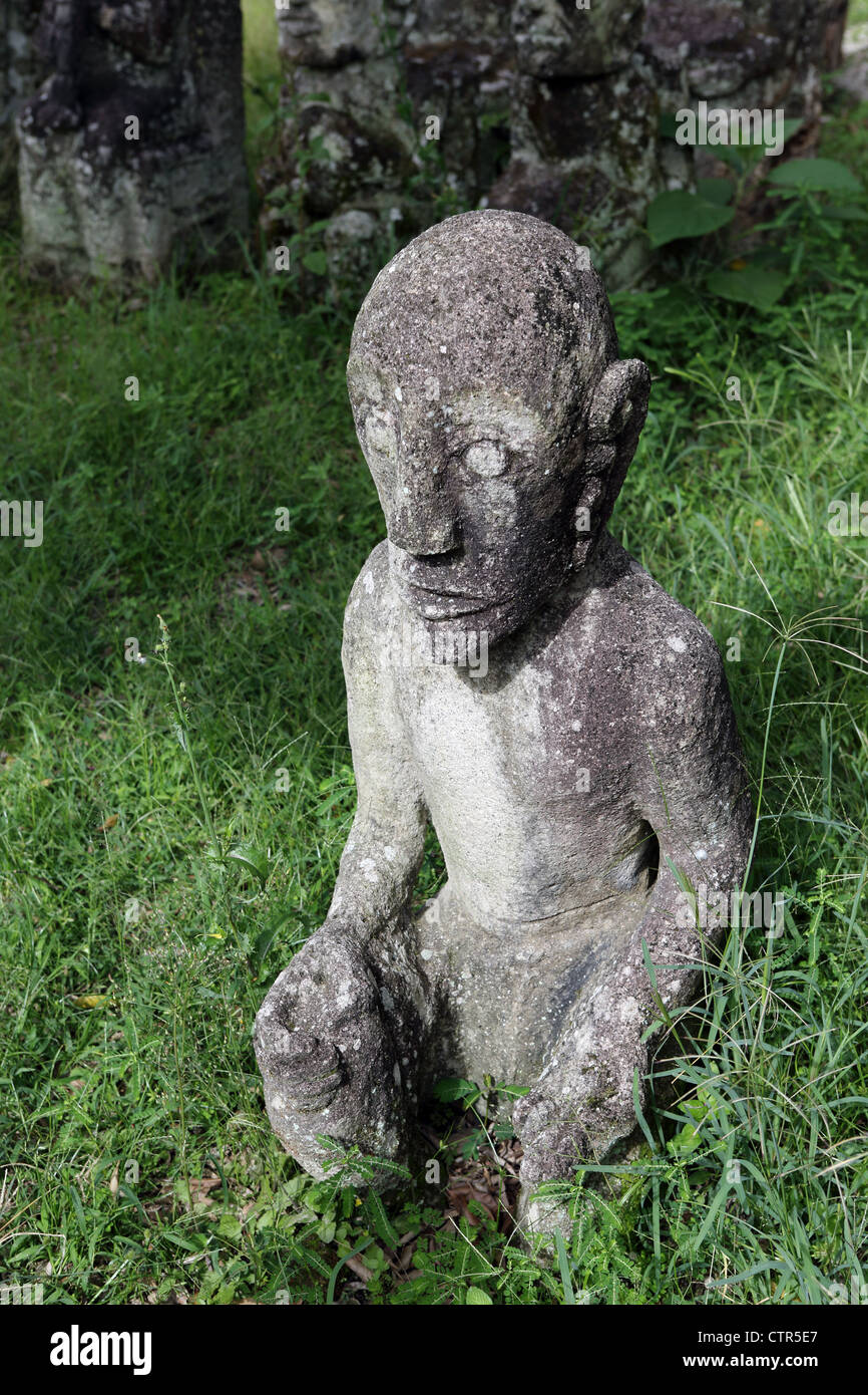 Ancient batak stone statue tomok hi-res stock photography and images ...
