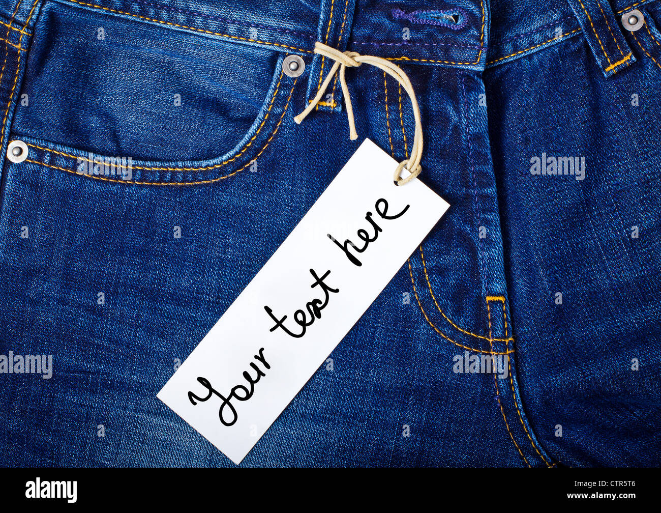 Jeans with a price tag Stock Photo - Alamy