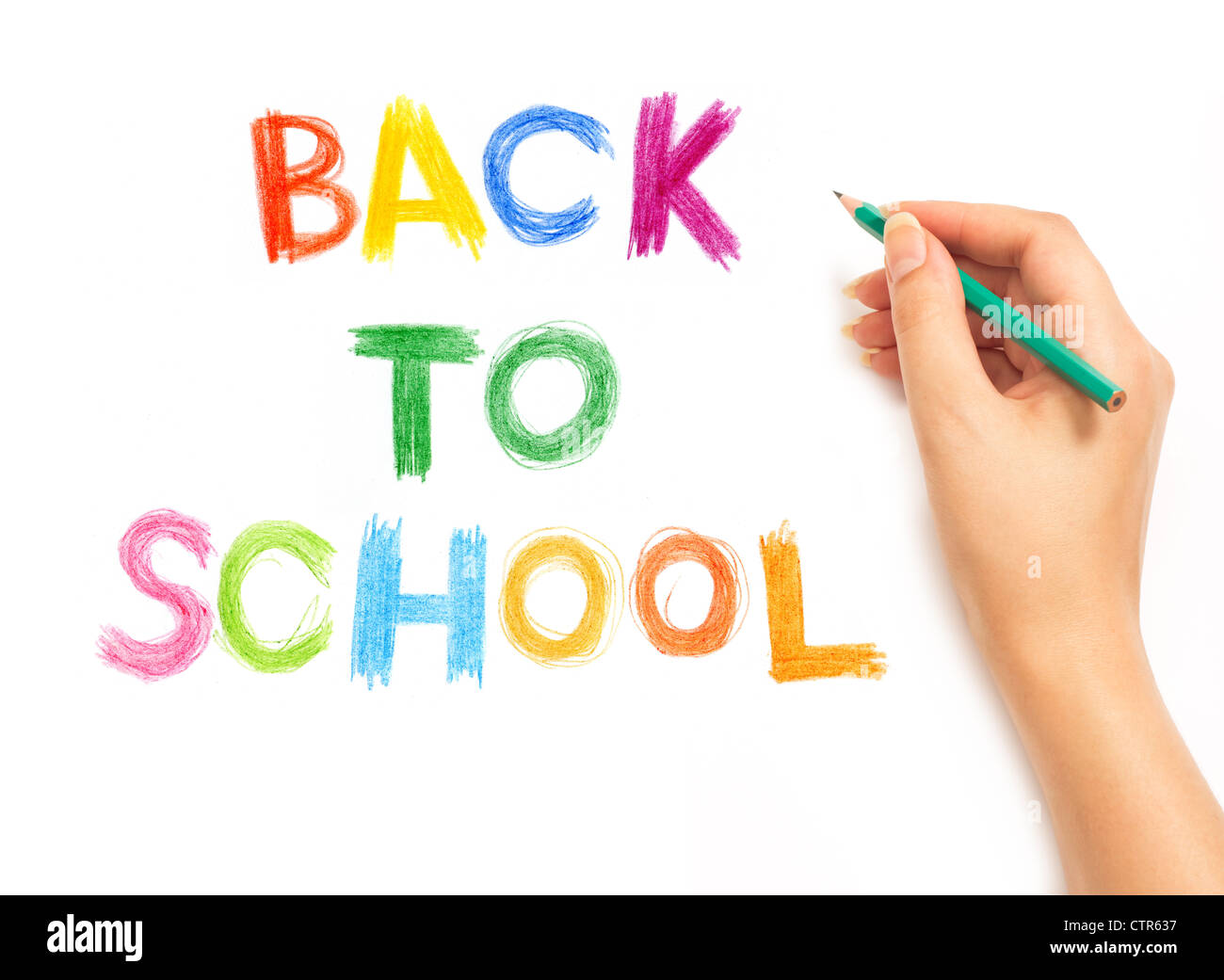 Hand writing with a pencil - back to school. On a white background ...